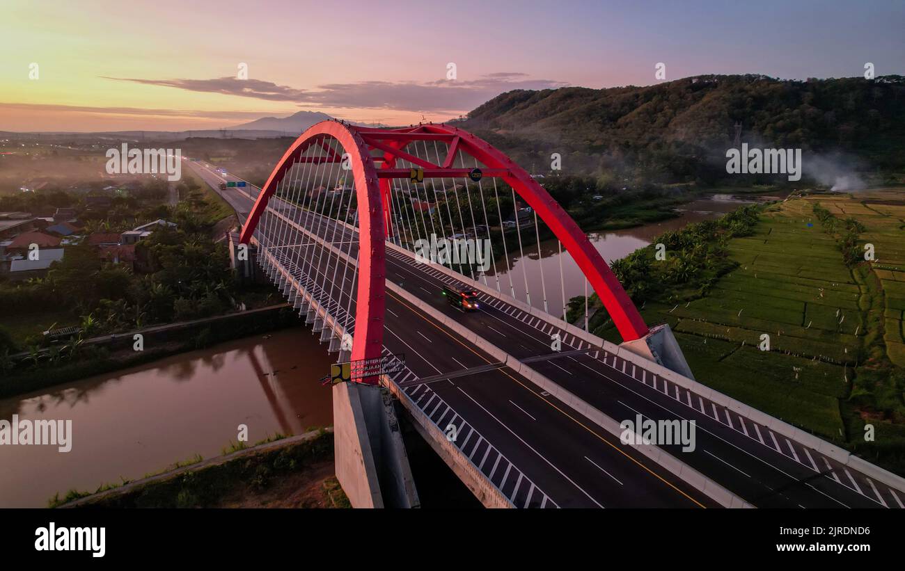 Aerial view of the Kalikuto Bridge, an Iconic Red Bridge at Trans Java ...