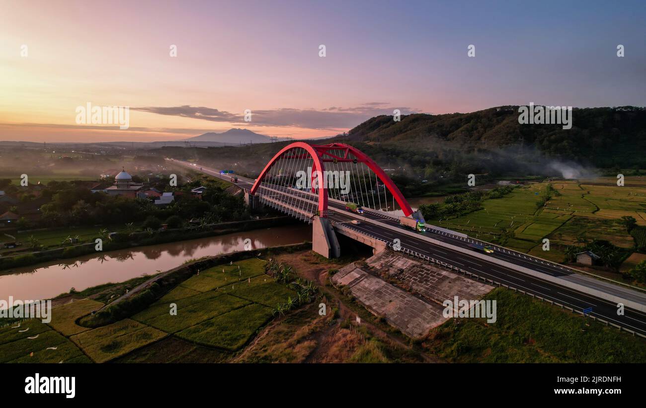 Aerial view of the Kalikuto Bridge, an Iconic Red Bridge at Trans Java ...