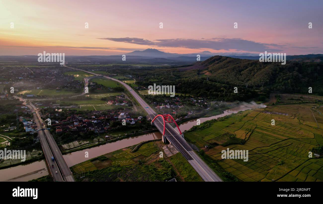 Aerial view of the Kalikuto Bridge, an Iconic Red Bridge at Trans Java ...