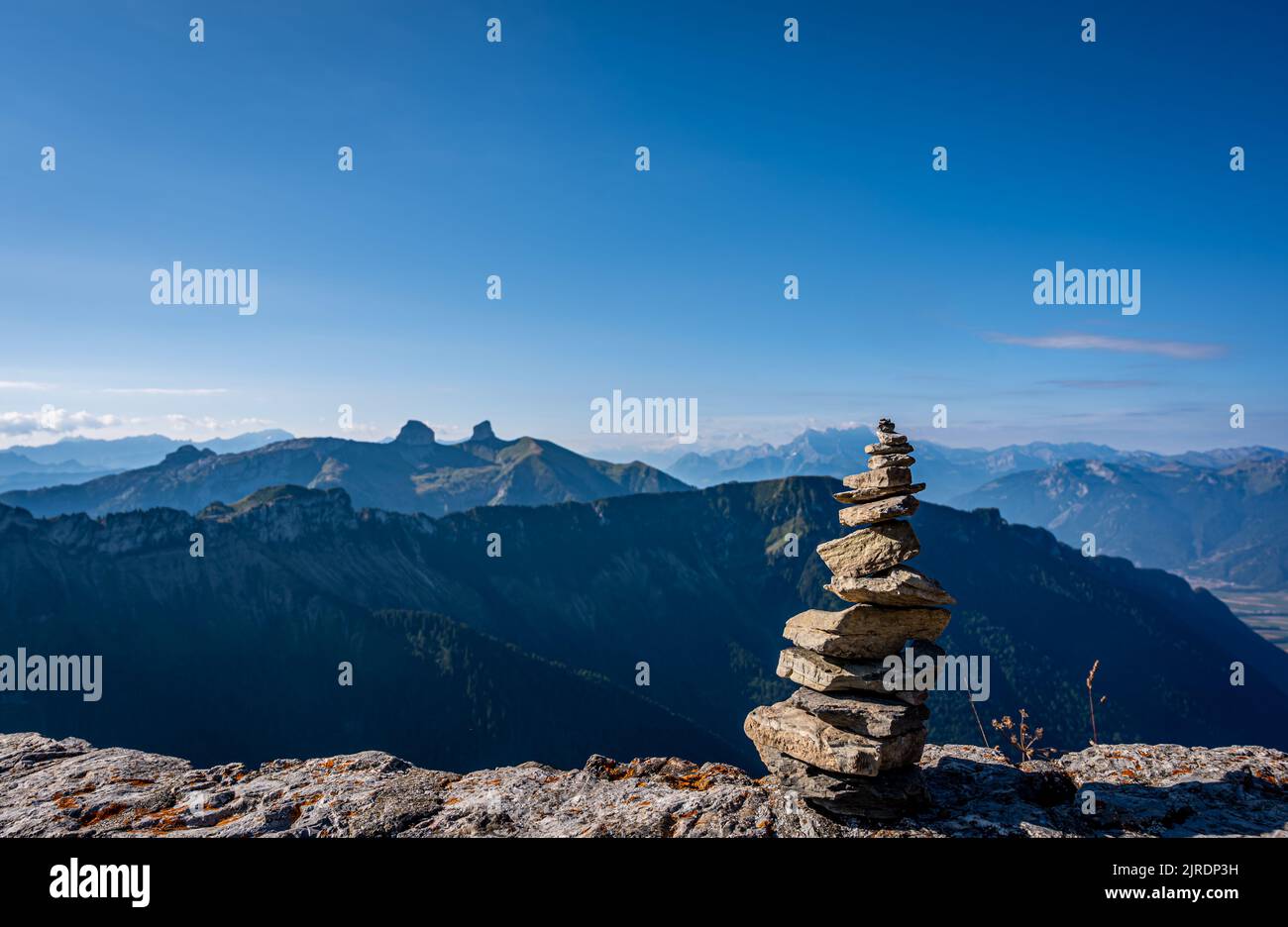 Landscape with mountain, sky and clouds. Rock Balancing, Stone Stacking ...