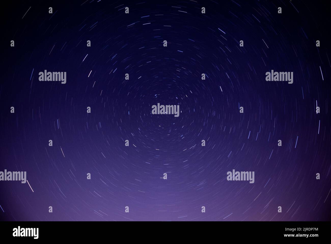 The Long exposure to the stars in the night sky, gives the imitation of ...