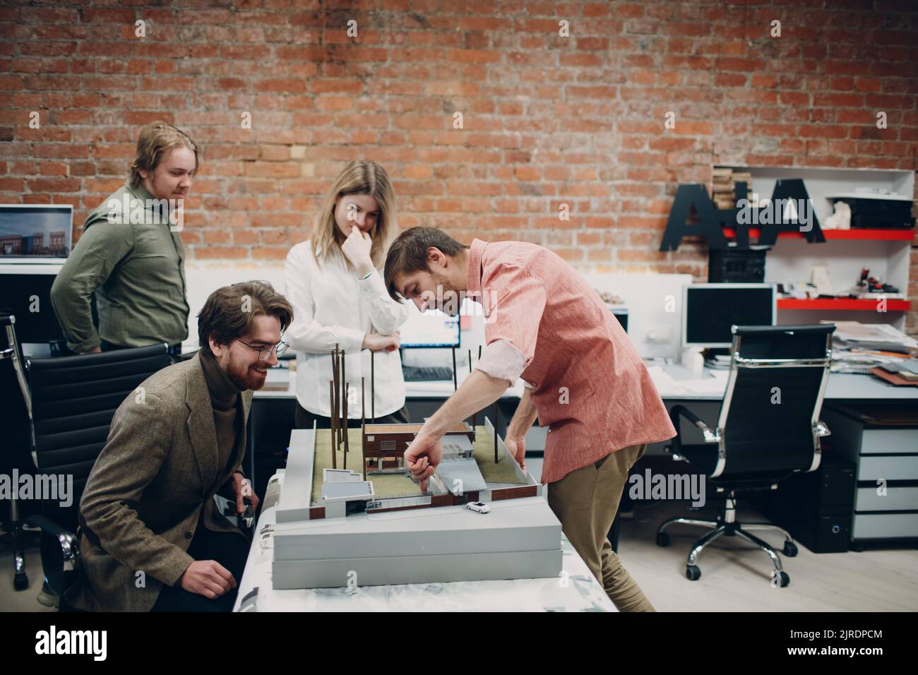 Architect group with blueprints and layout design project at office ...