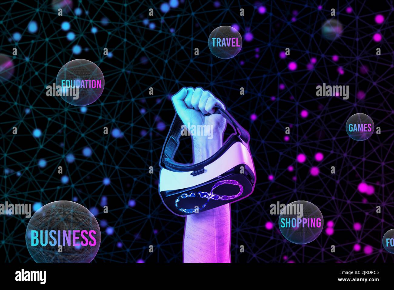 A male hand holds VR glasses with symbol of metaverse. Black background ...