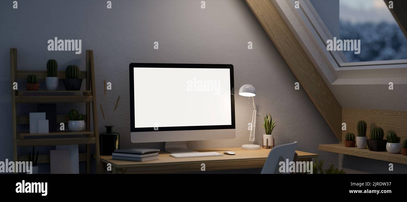 Minimal Scandinavian home workplace at night in the attic room interior ...