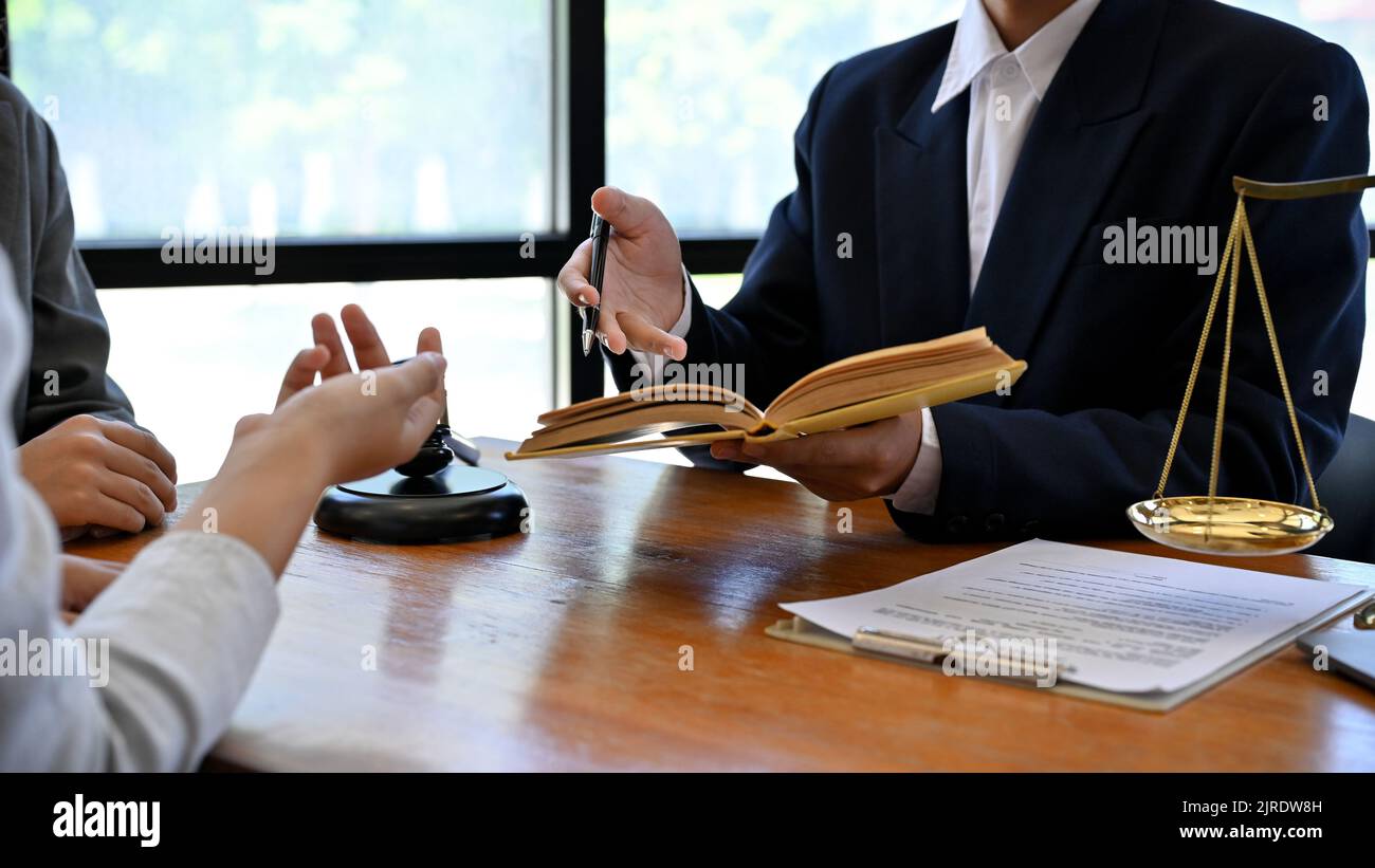 A smart and successful male lawyer or business legal consultant having ...