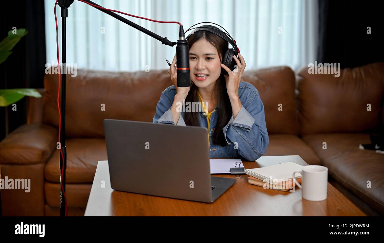 Beautiful and attractive young Asian female freelance podcast radio ...