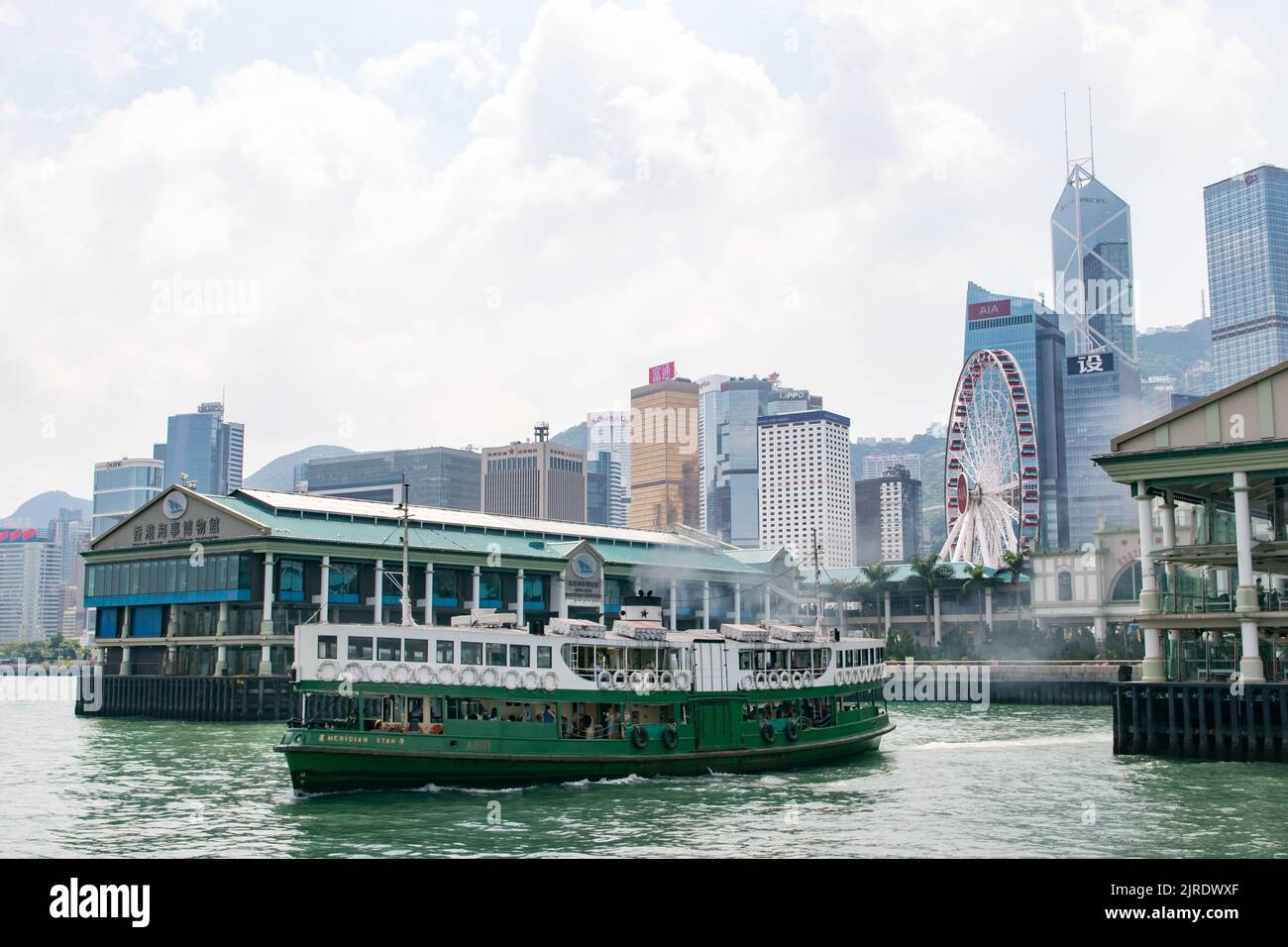 Star Ferry on the way to Central Pier harbor with Hong Kong's ...