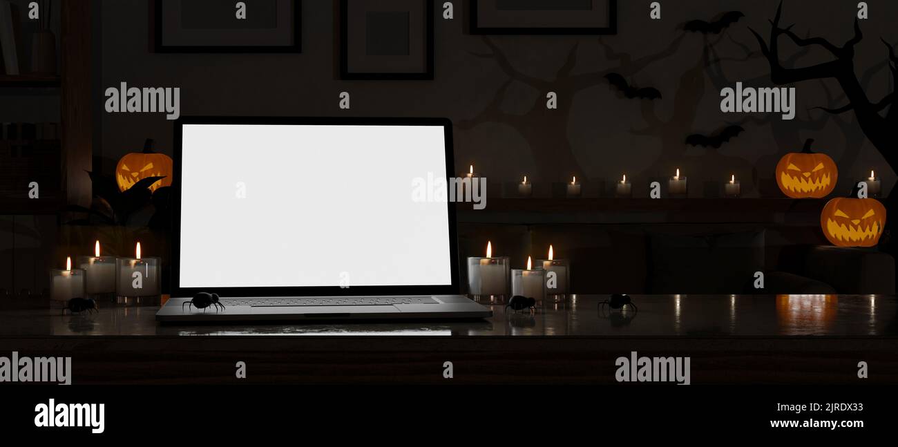 Modern dark office desk in Halloween theme with laptop white screen ...