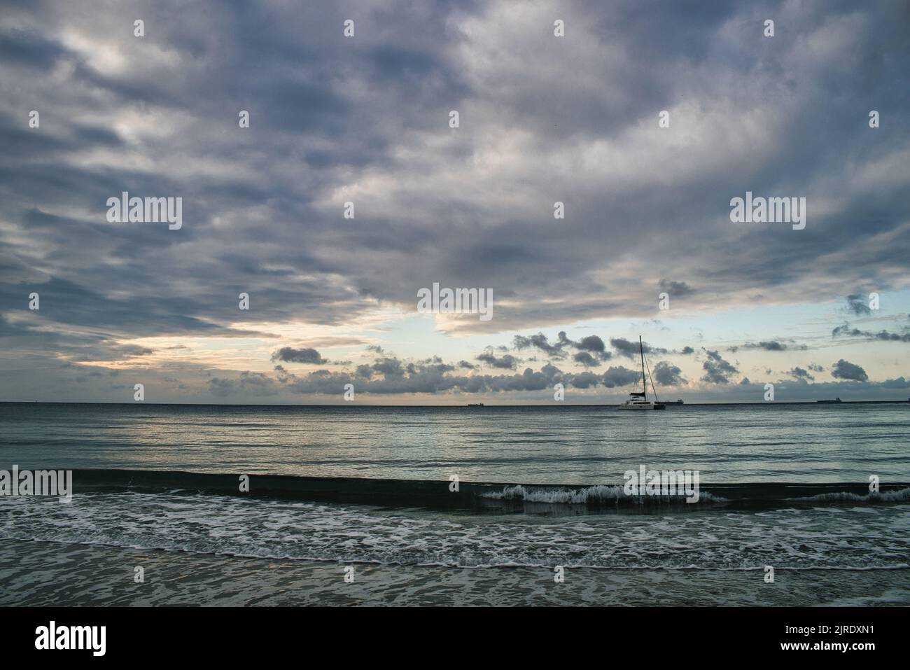 A beautiful shot of calm sea under a cloudy sky Stock Photo - Alamy