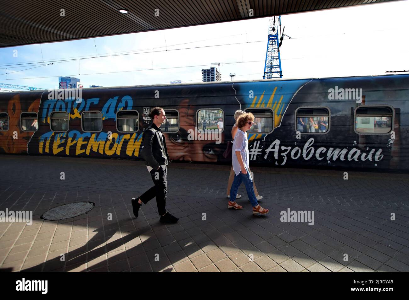 KYIV, UKRAINE - AUGUST 23, 2022 - People pass by the Train to Victory ...