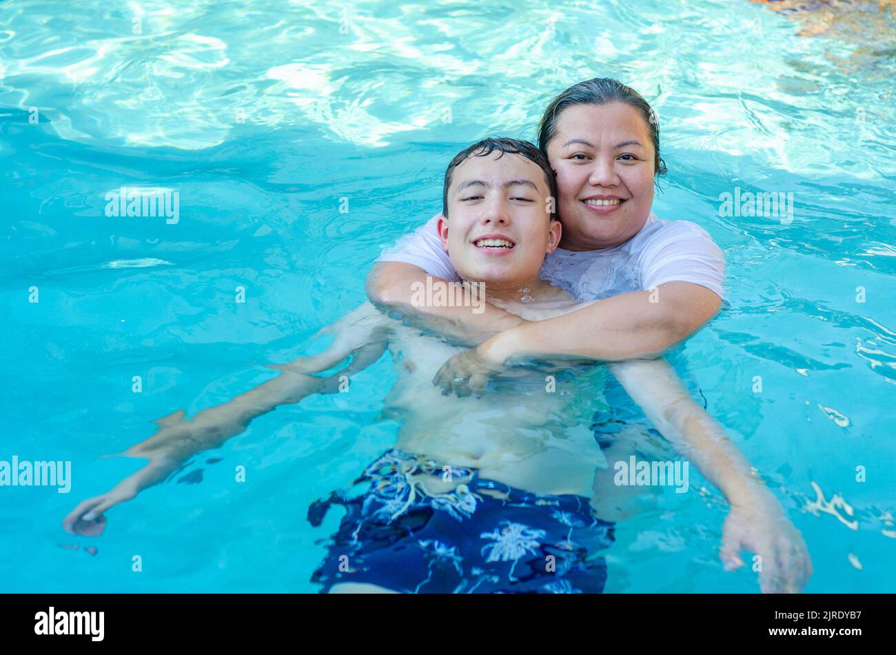 Mother son cuddling hi-res stock photography and images - Alamy