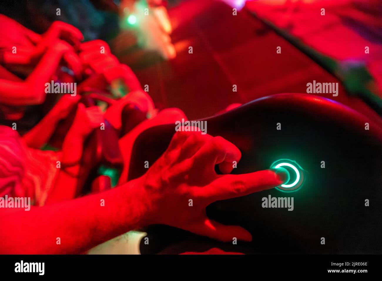 Rust, Germany. 10th Aug, 2022. A button can be seen next to a hand on ...