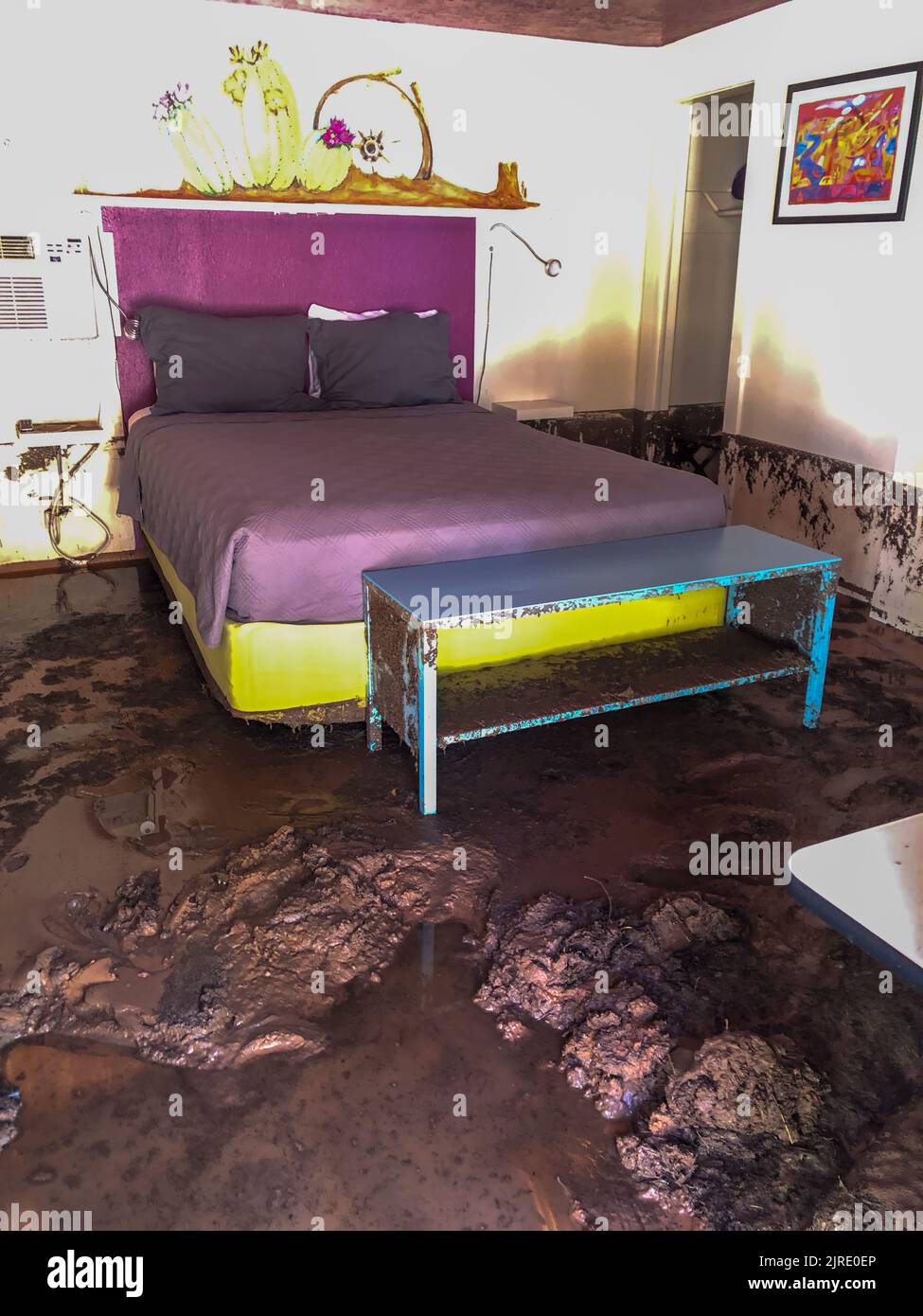 Flood damgage inside a motel room from a flash flood the night before ...
