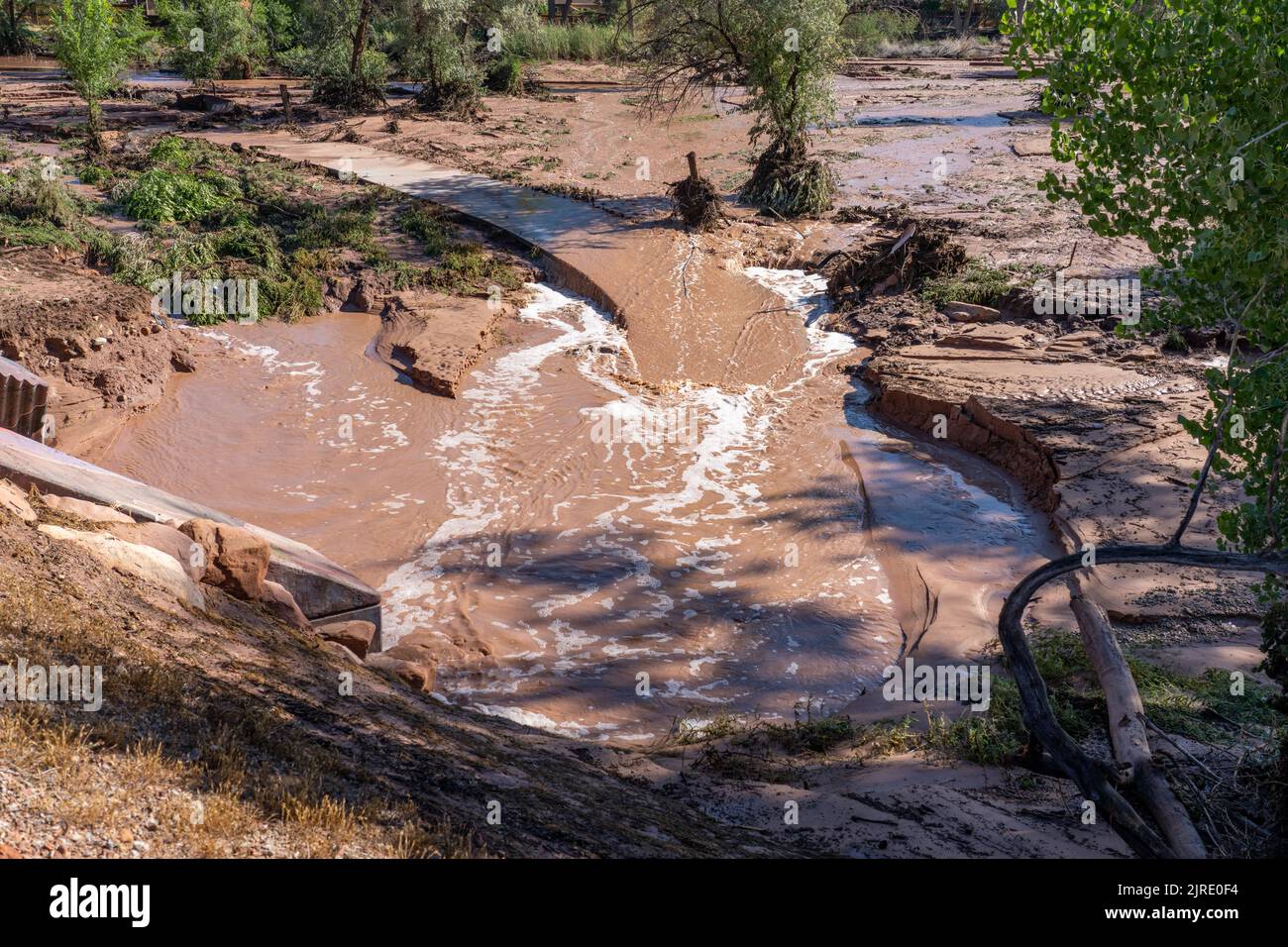 Receding flood waters cover the flooded Mill Creek Parkway the day ...