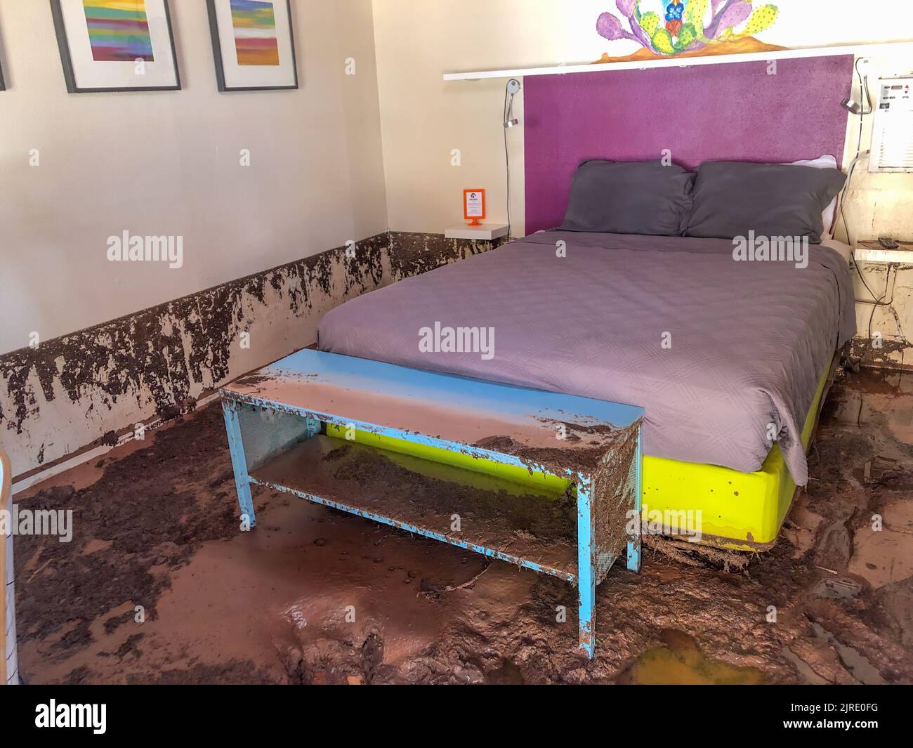 Flood damgage inside a motel room from a flash flood the night before ...