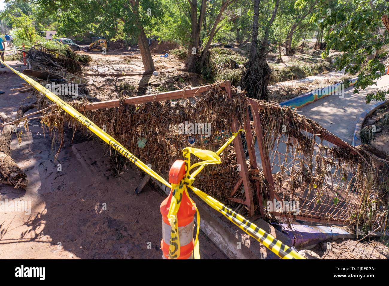 Bridge guardrail damaged by flood debris from a flash flood on Mill ...