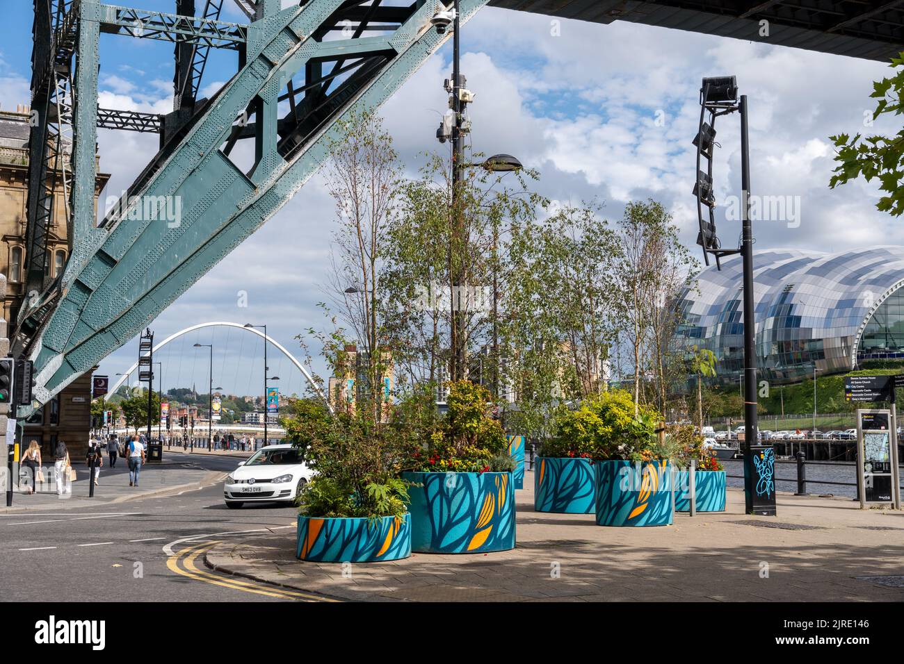 Planters with commissioned artwork, by Bobzilla, under the Tyne Bridge ...