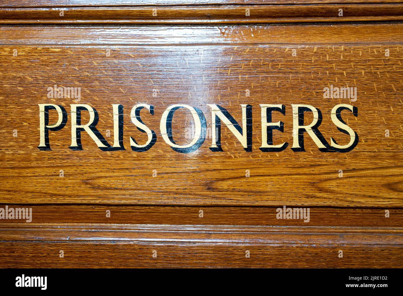 An antique painted door sign of wording in capital letters, showing ...