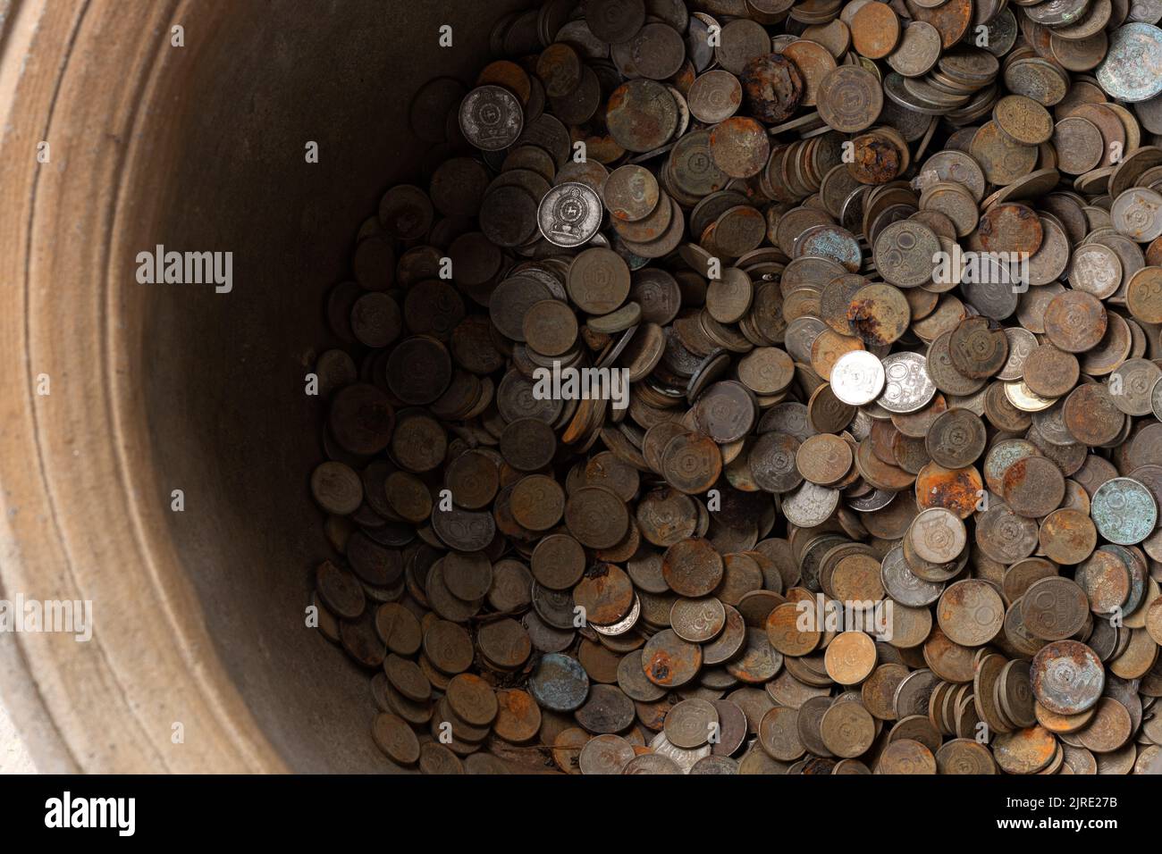 Very old collection of rusty old coins in a metal container Stock Photo ...