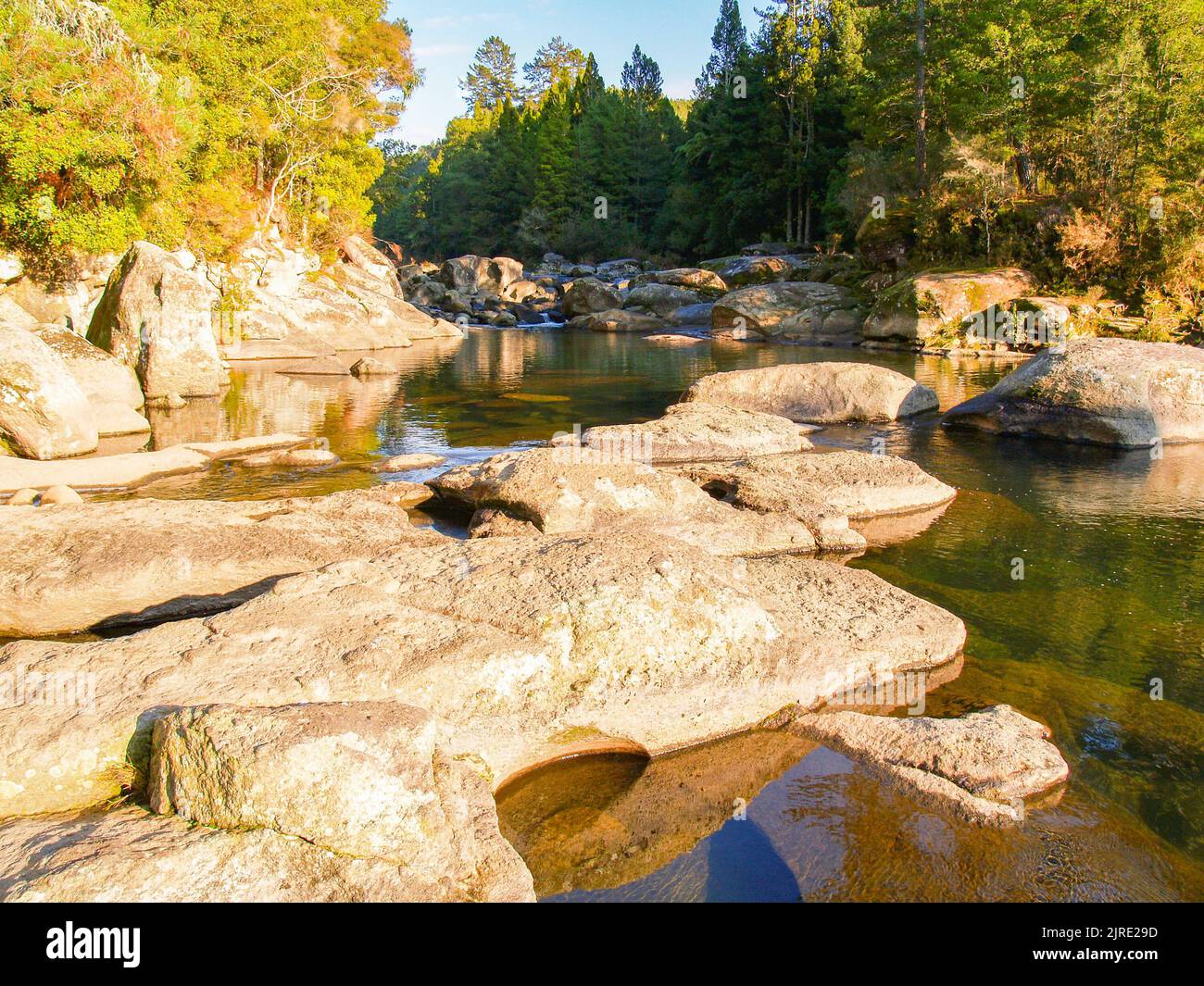 Stream and waterfall over rocks at McLaren Falls Park and Lake Stock ...
