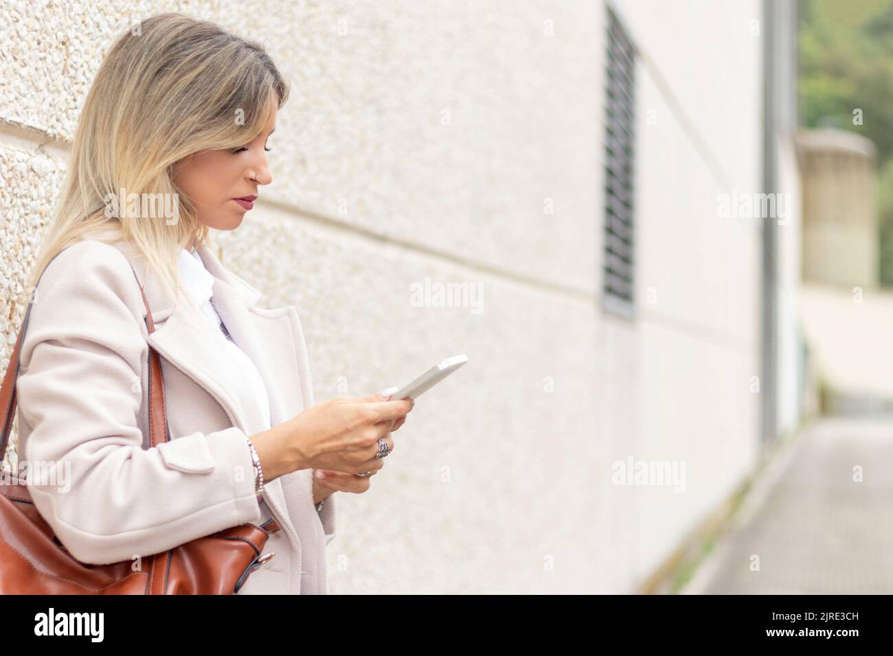 Smart woman communicating mobile phone hi-res stock photography and ...