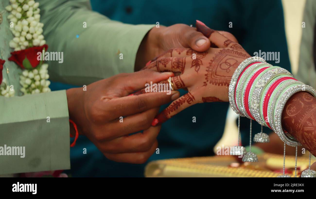 Indian grooms hand hi-res stock photography and images - Alamy