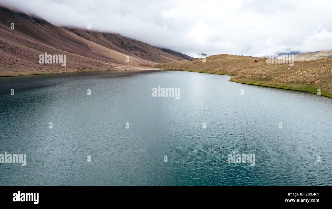 cloudy overcast day with glacier blue water at Chandra Taal Lake in ...