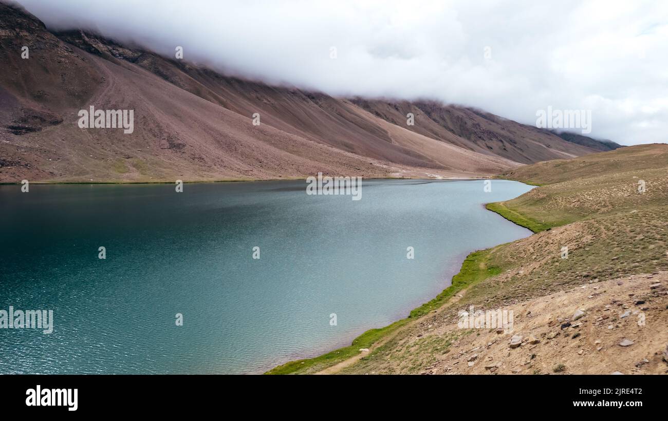 Beautiful blue landscape of Chandra Taal Lake on cloudy day in Spiti ...