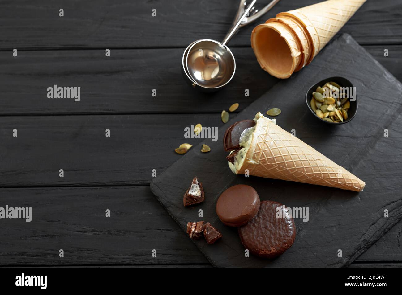 The process of making homemade ice cream on a black background ...