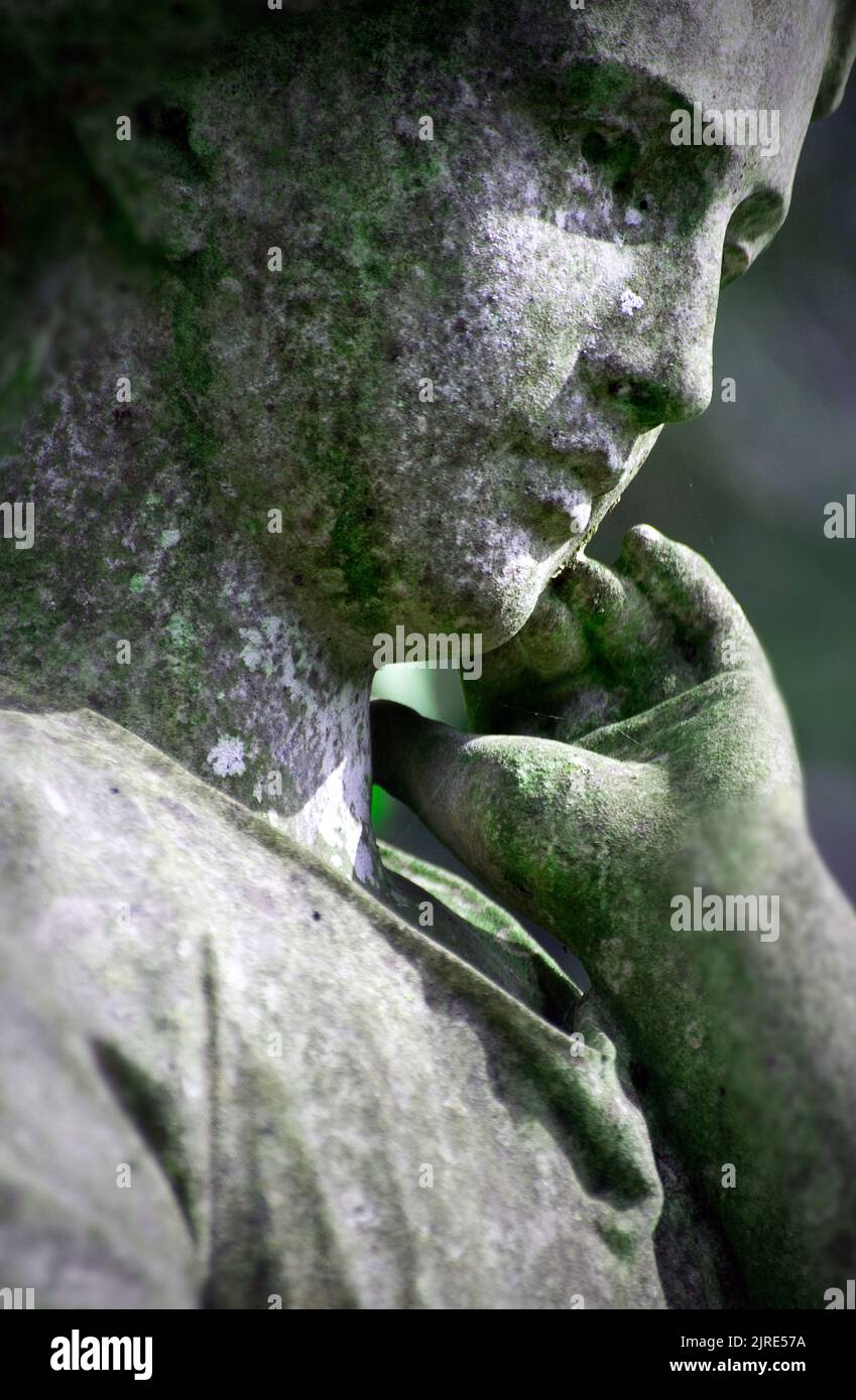 carved statue on tomb in highate cemetary london england Stock Photo ...