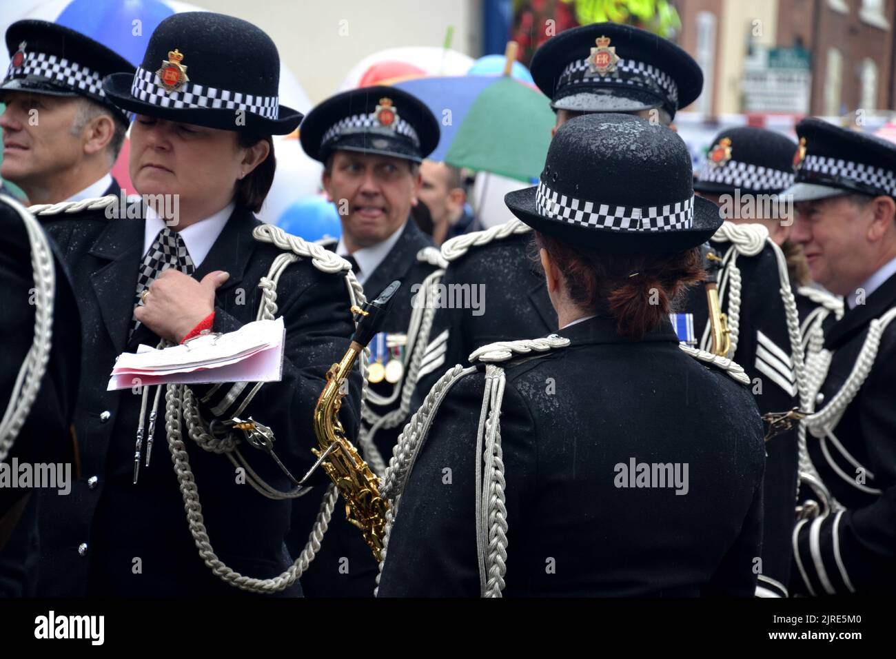 Greater Manchester Police band members in uniform getting ready to play ...