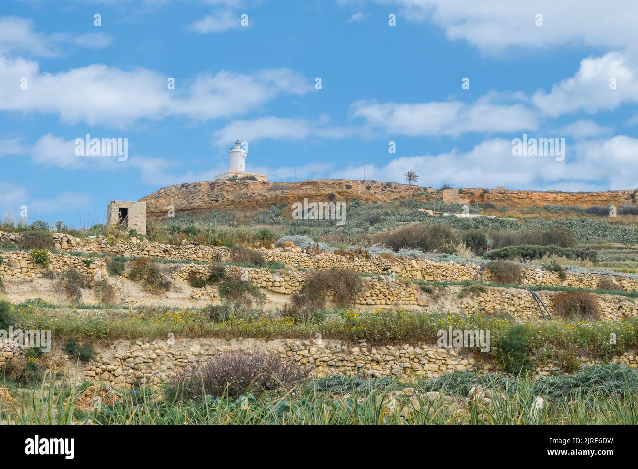 Flat topped plateau hill in the rural village of Ghasri, Gozo, Malta ...