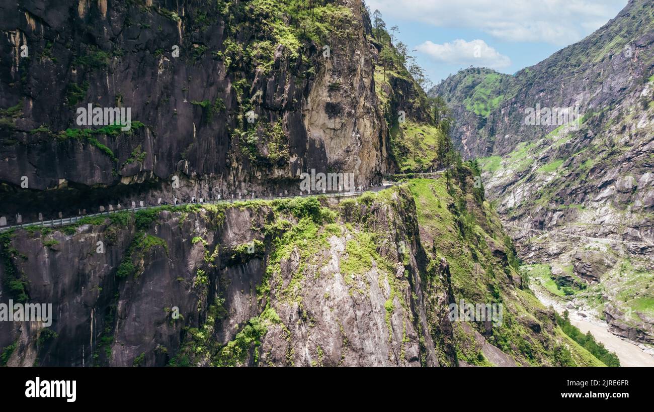 aerial landscape of dangerous Tranda Dhank road carved into the ...