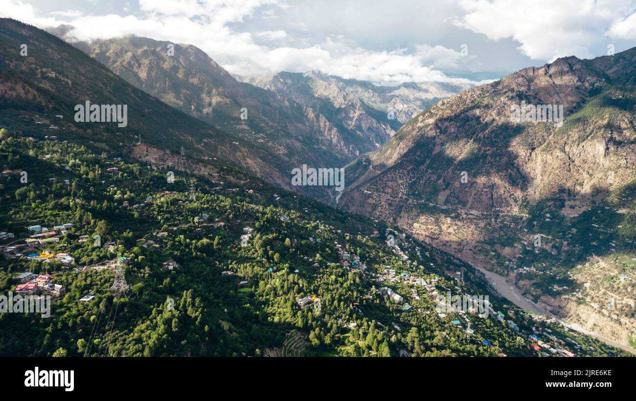 panoramic aerial landscape of Himalayan Mountains at sunset in village ...