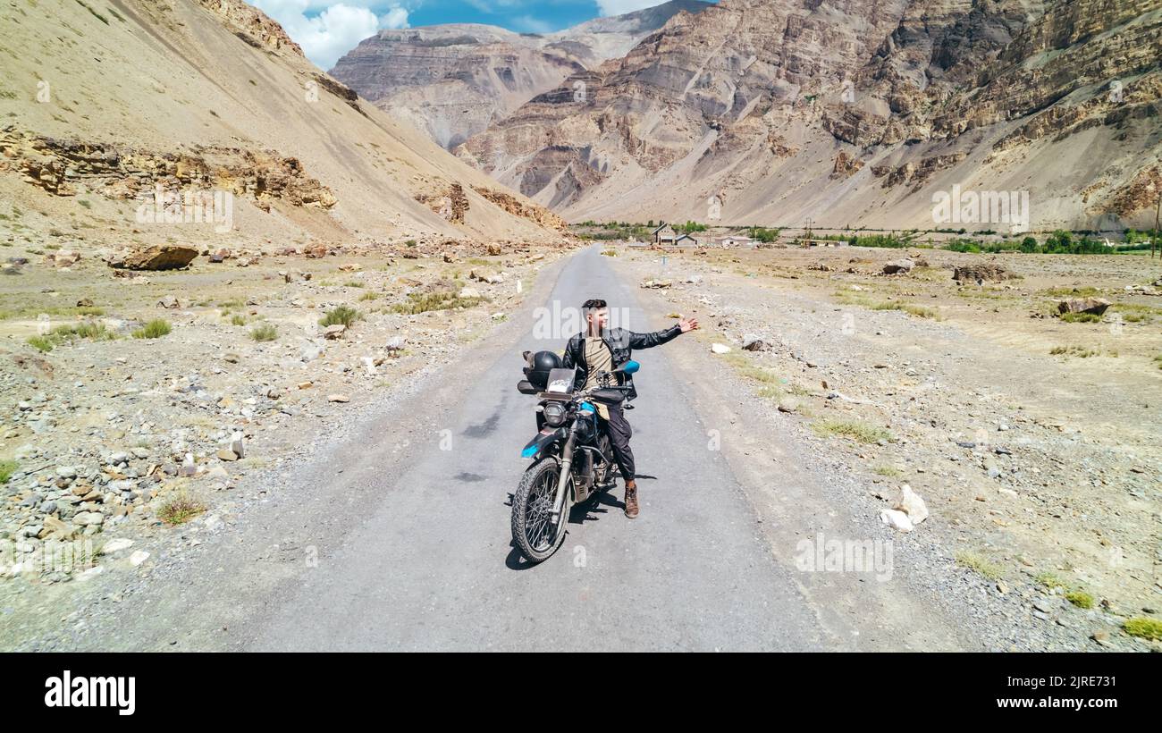 man traveling on motorcycle through Spiti Valley in Himachal Pradesh of ...