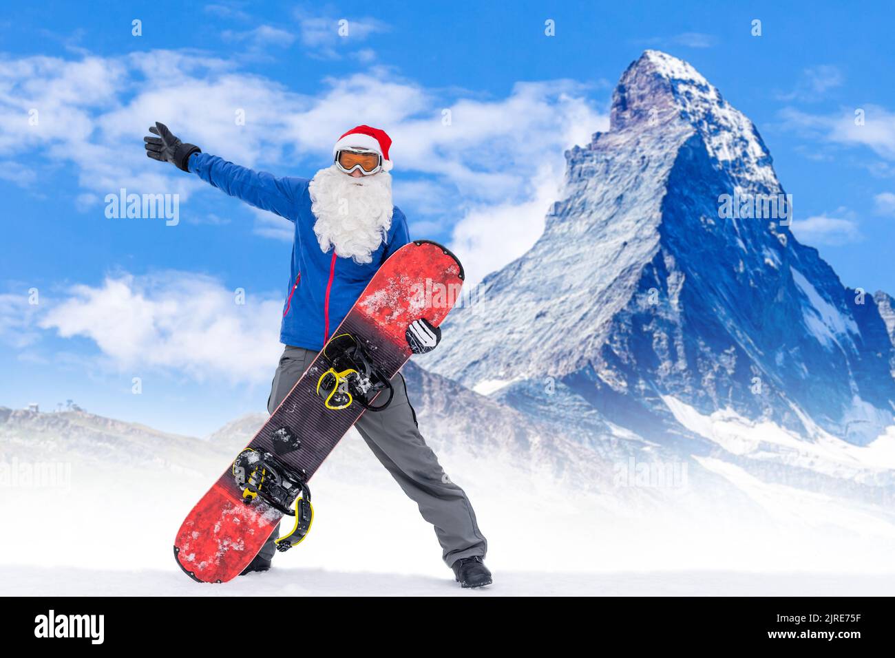Santa Claus on a snowboard. Man in a red suit Santa Claus with a white ...