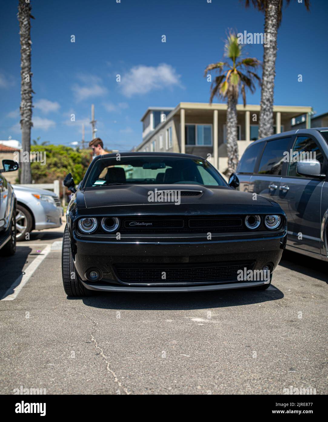 Vertical shot of a Black Dodge Challenger car Stock Photo - Alamy