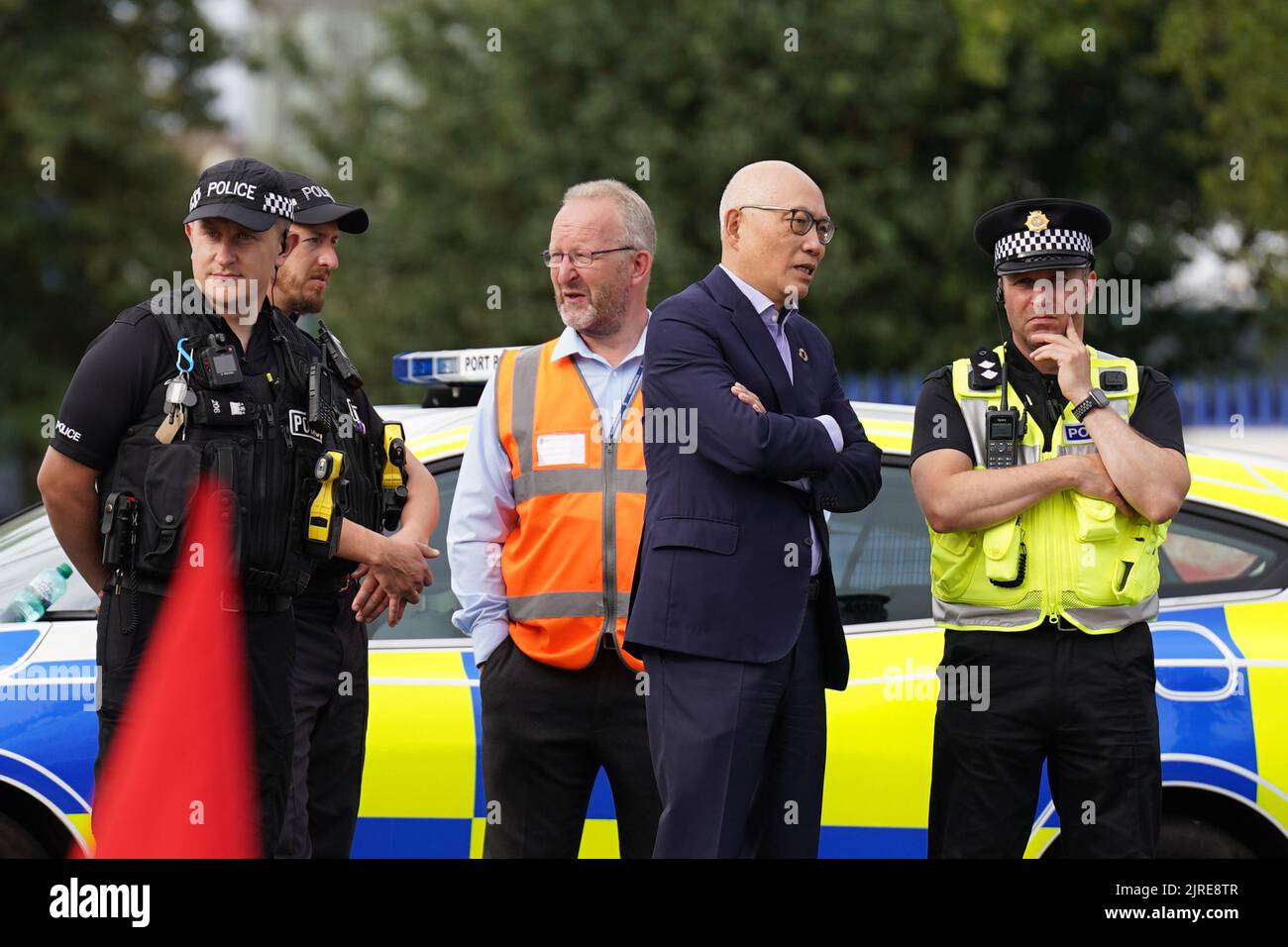 Hutchison Ports Chief Executive Officer Clemence Cheng with police ...