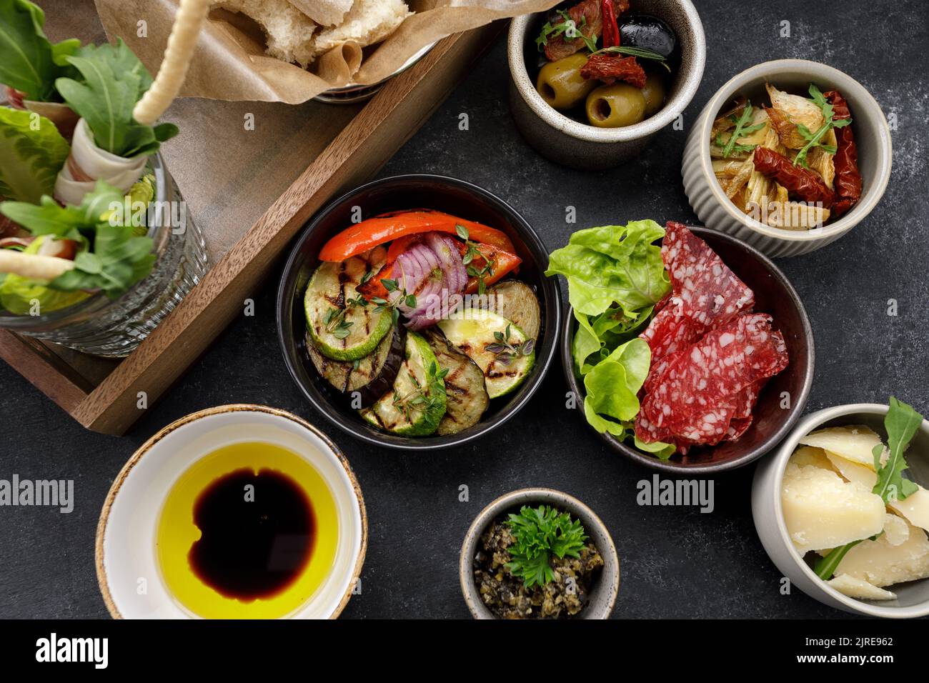 Various appetizers, snacks from vegetables on gray concrete Stock Photo ...