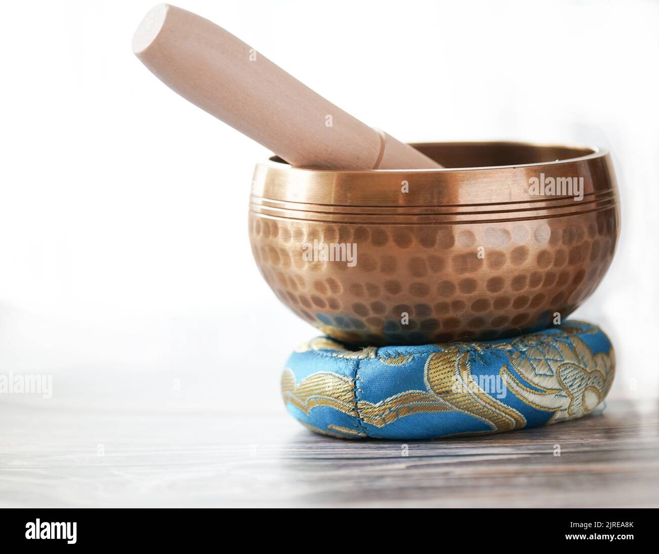 A hand-hammered Tibetan singing bowl set for meditation, musical ...