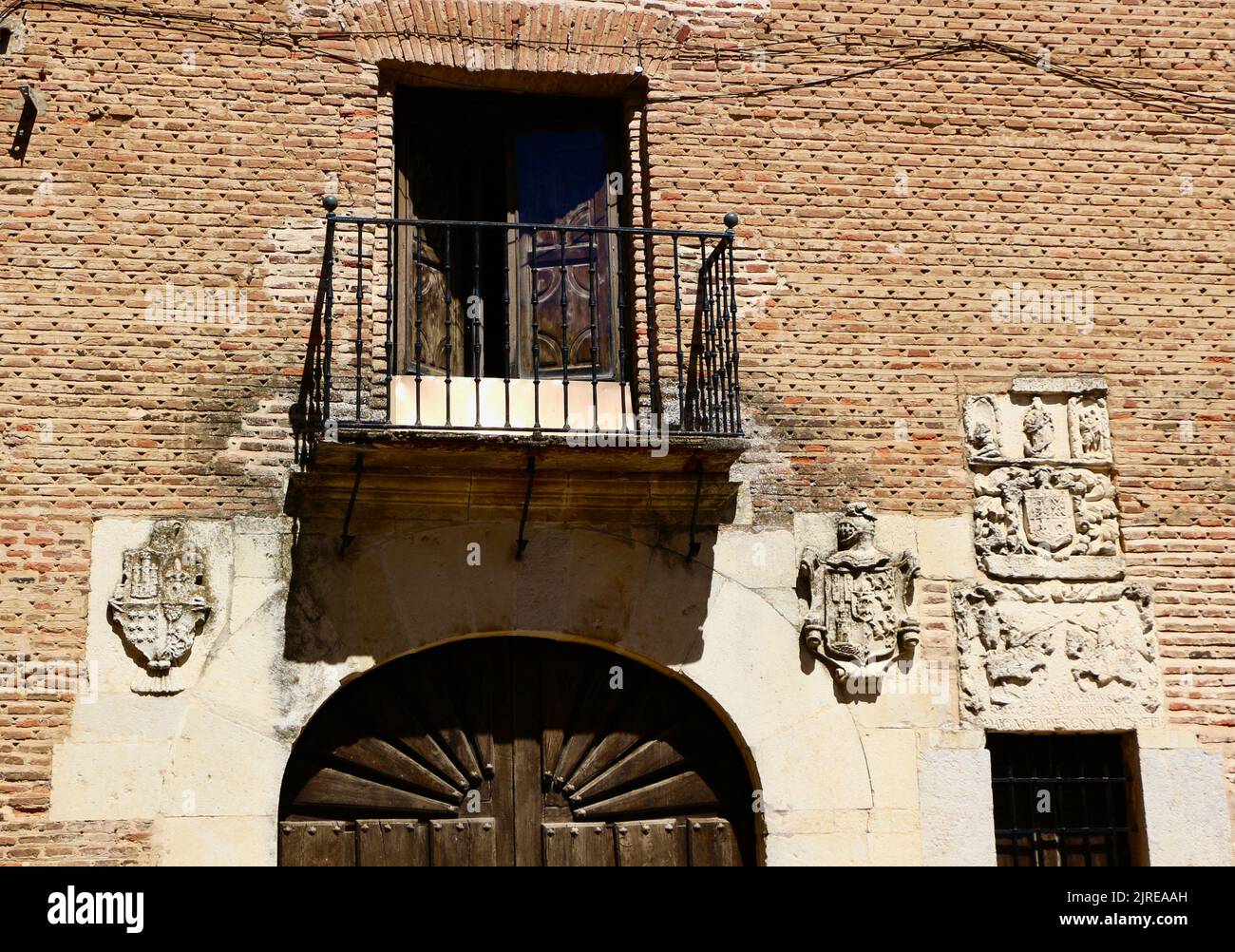 Facade with three coat of arms and balcony of the Casa del Marqués de ...