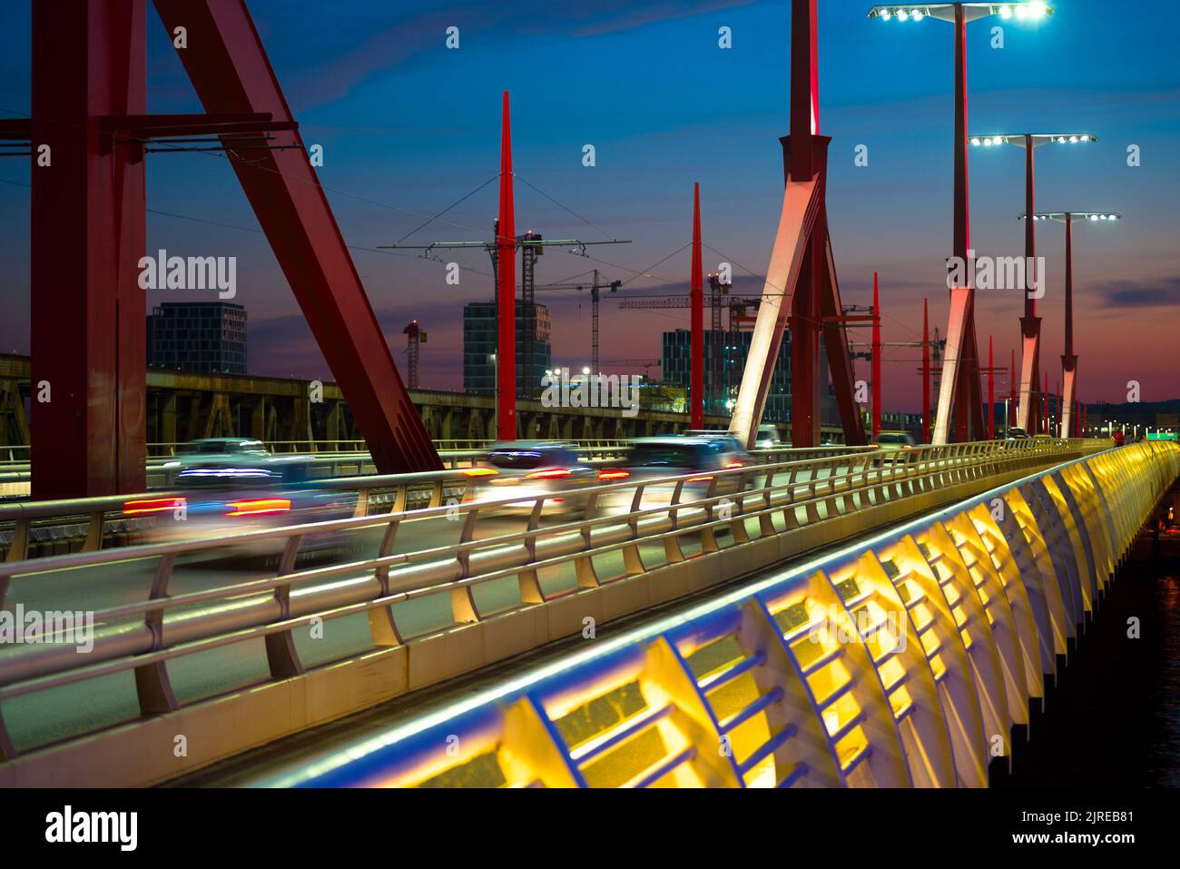 Traffic on a bridge at night Stock Photo - Alamy
