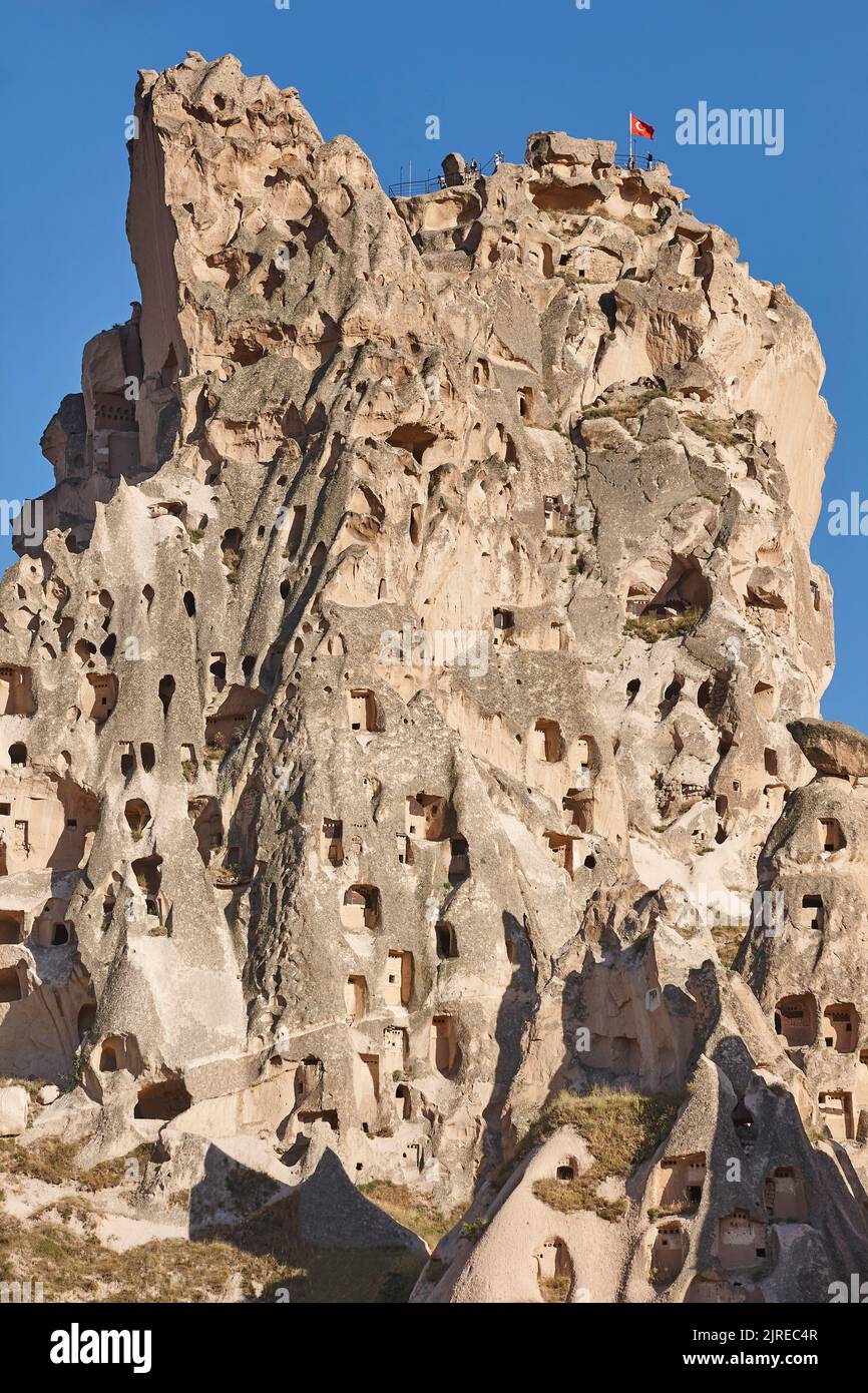 Ancient stone houses caves in Usichar fortress village. Cappadocia ...