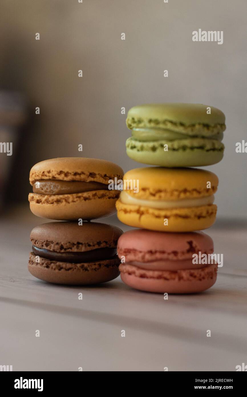 Colorful macaroons close-up on gray background Stock Photo - Alamy