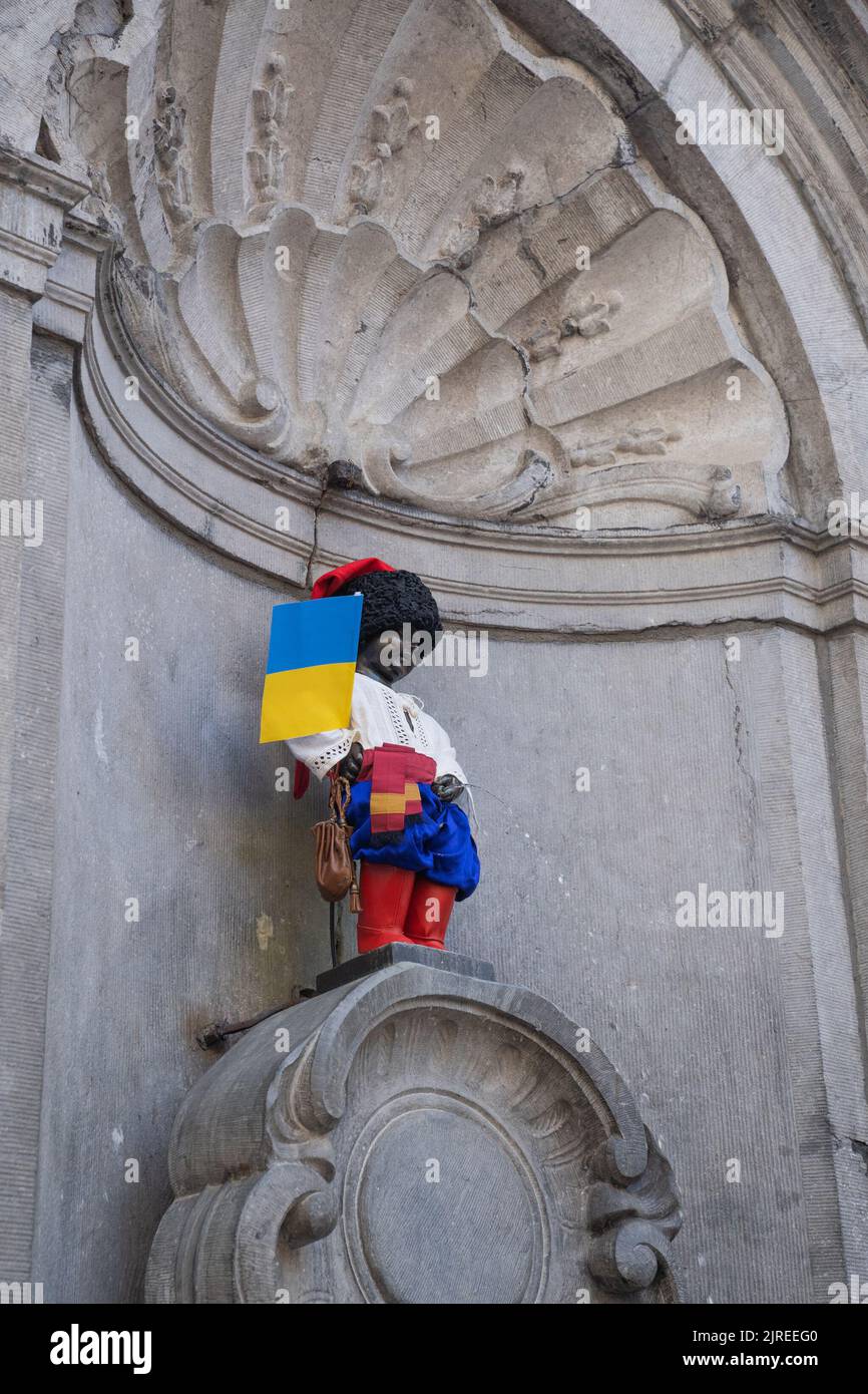 The Manneken Pis statue in the city center of Brussels wears a ...