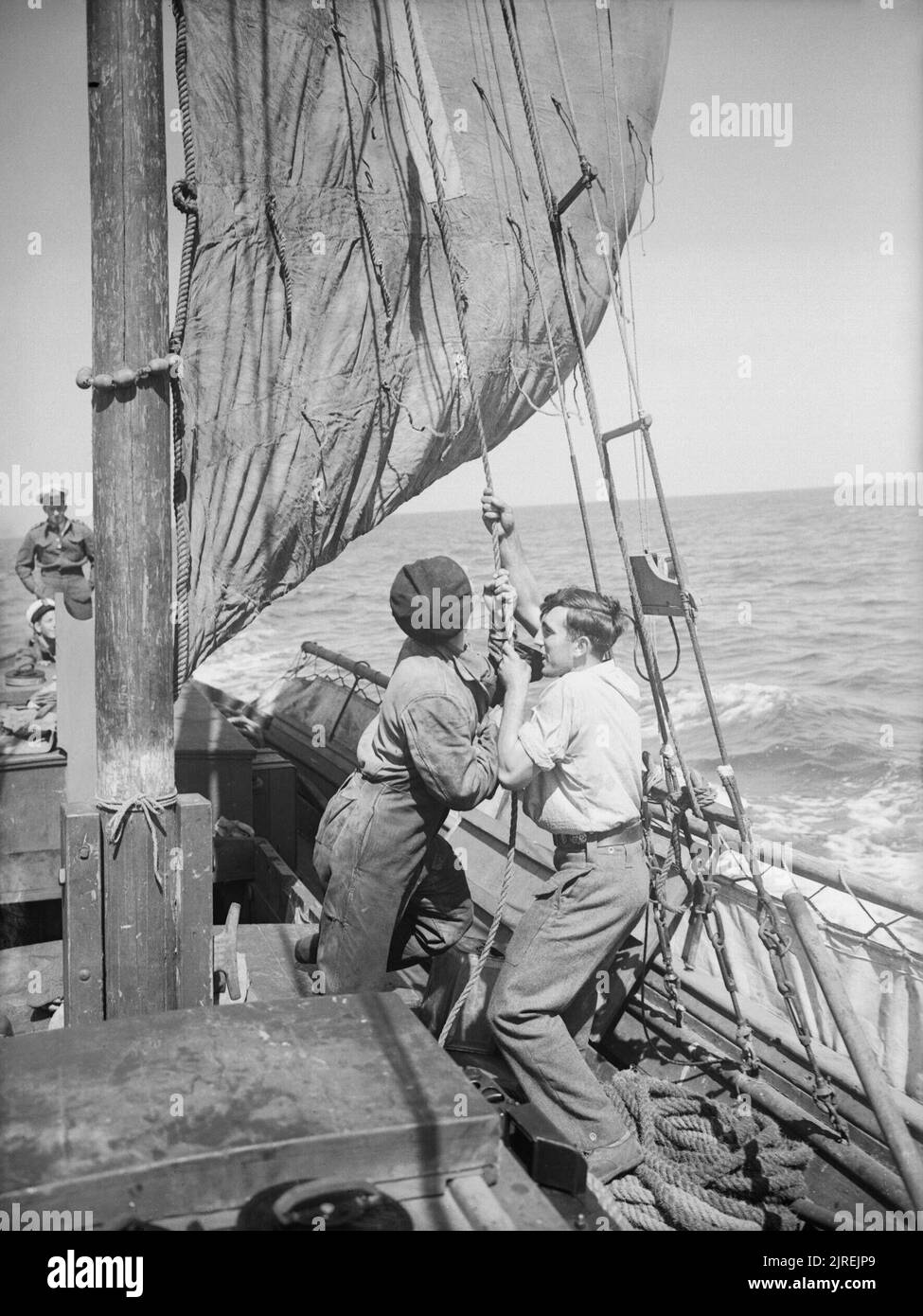 The Royal Navy during the Second World War Two sailors hoisting the ...