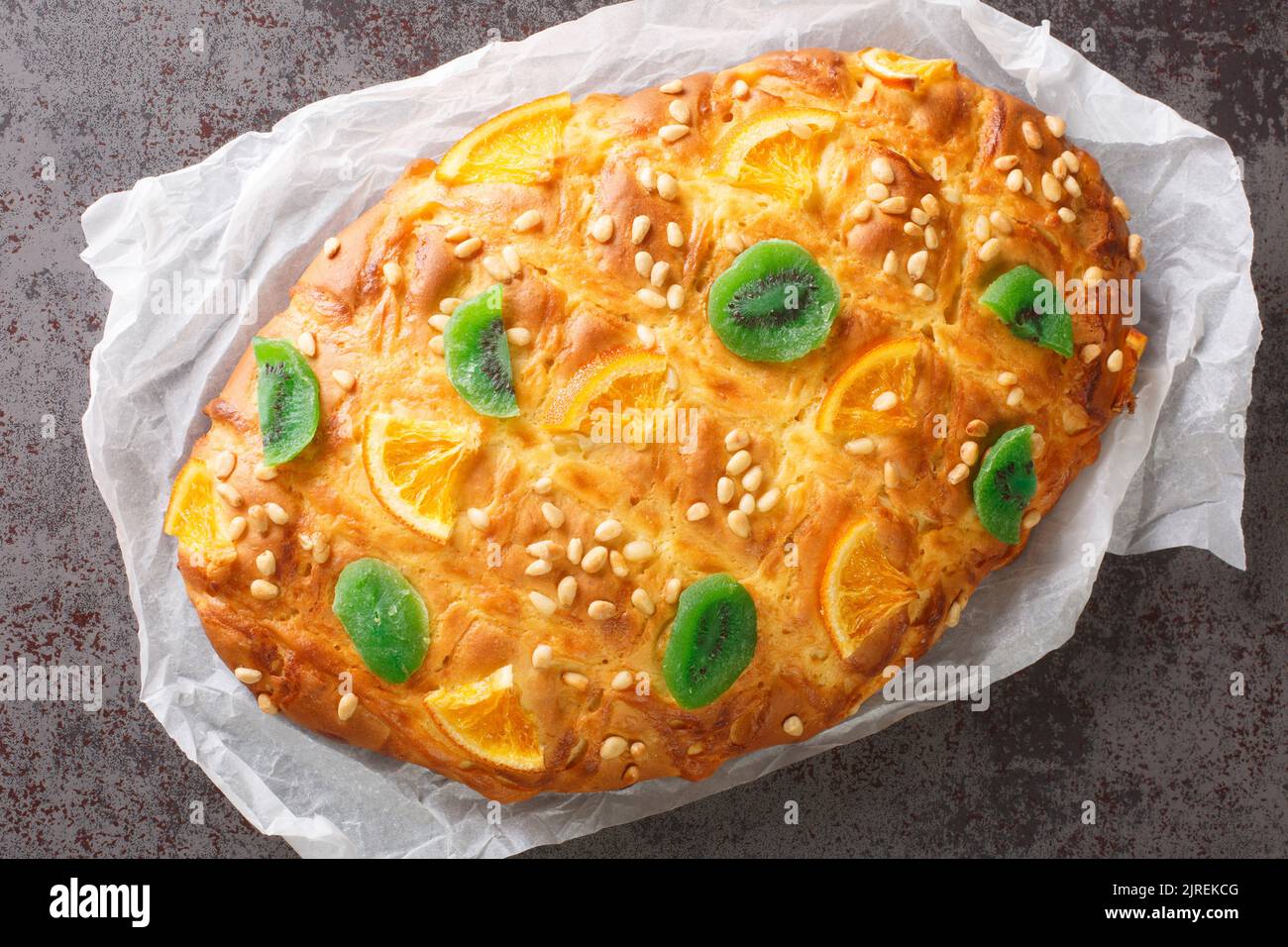 Traditional Spanish Catalan coca de Sant Joan with pine nuts, candied ...