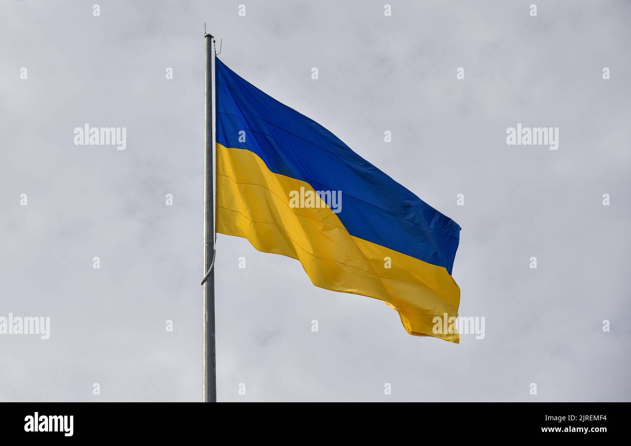 The flag of Ukraine raised on the flagpole on National Flag Day in Lviv ...