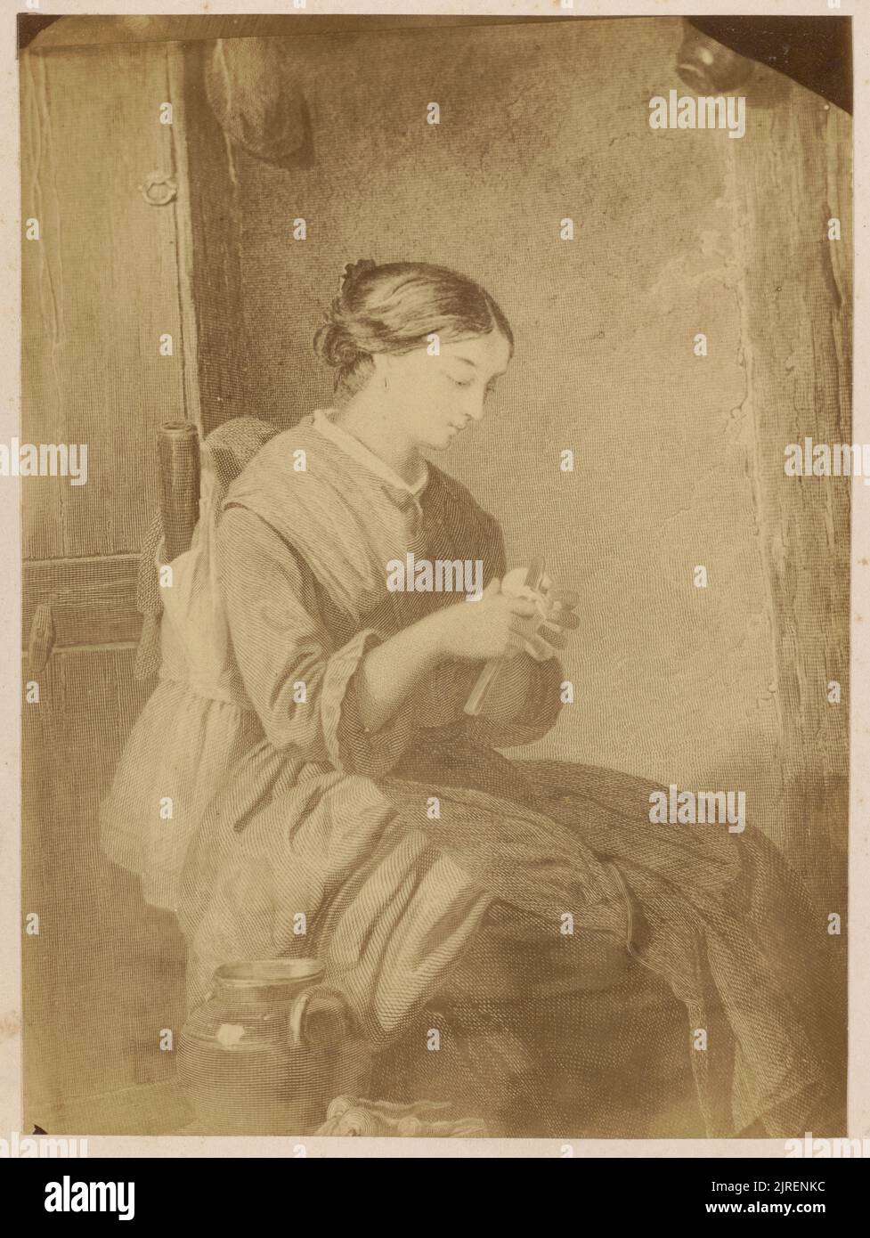 Woman peeling vegetables from the album hi-res stock photography and images - Alamy