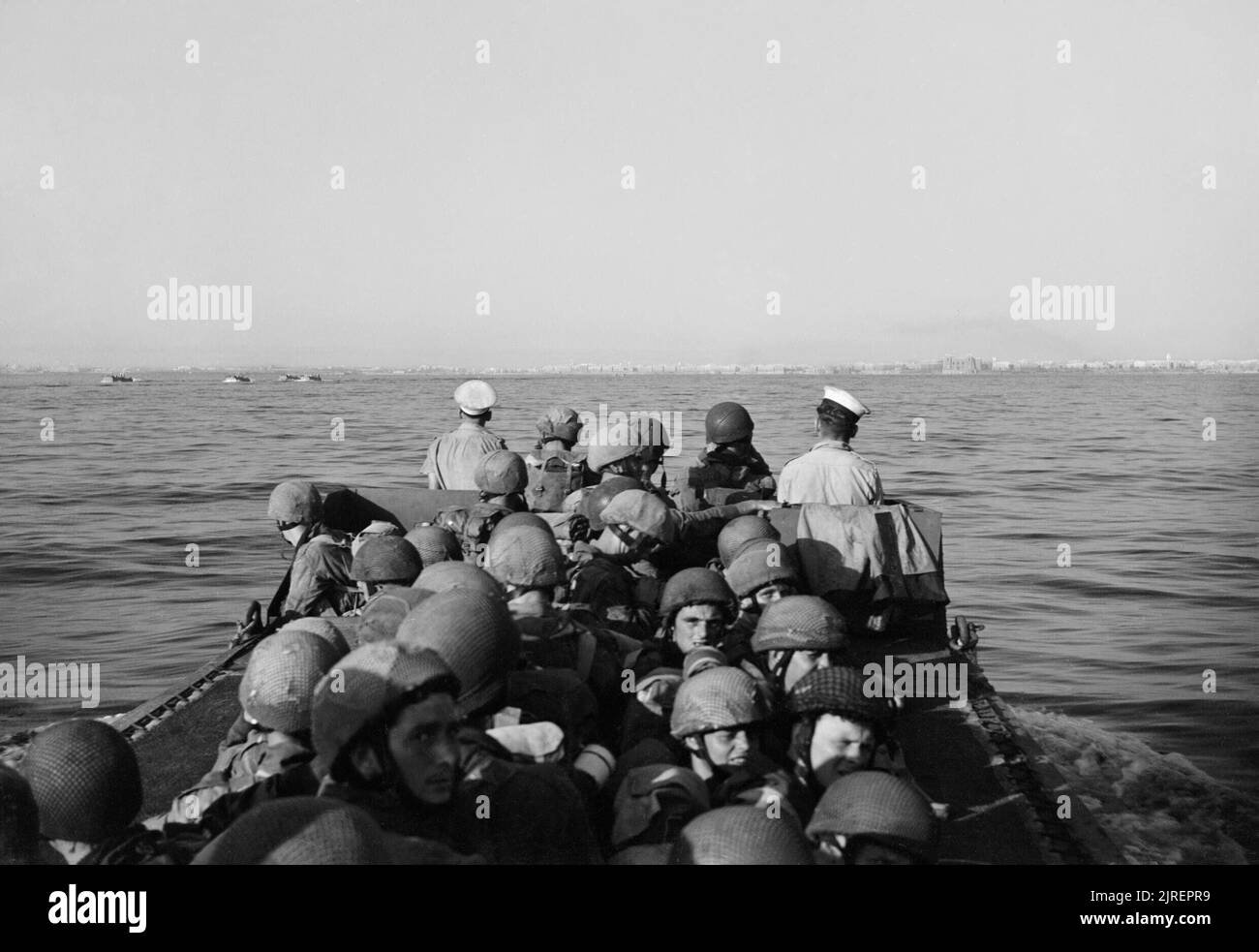British airborne troops approaching Taranto in a landing craft, during ...